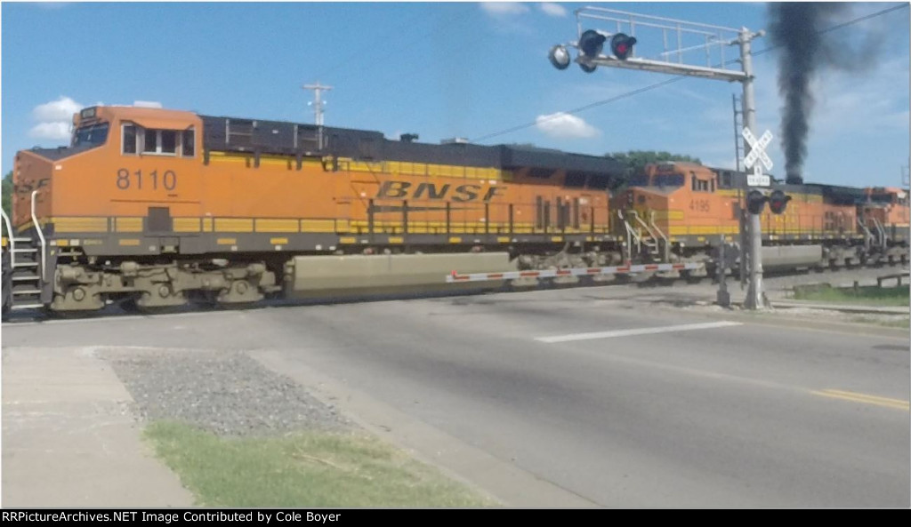 BNSF 8110 (GE ES44C4) leads BNSF Stack Train with H3, H2 and H1 in order
